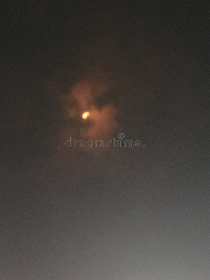 Solar Eclipse through the Clouds Stock Image - Image of shadow, event ...