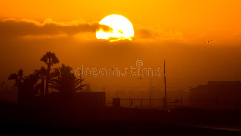 Sun Peaking through the Clouds Stock Photo - Image of coast, color ...