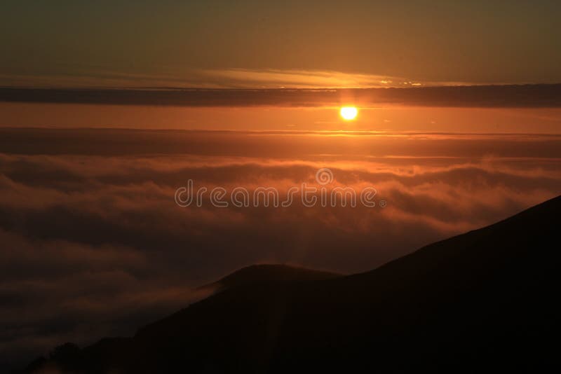 Sun peaking through stock photo. Image of peaking, clouds - 97000376