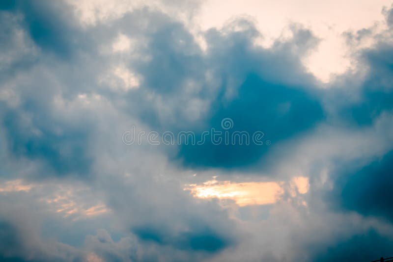 The Sun Peaking through the Clouds during Sunset at Ocean Isle Beach ...
