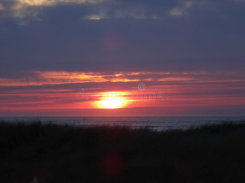 Sun peaking through stock image. Image of sunset, peaking - 160661535