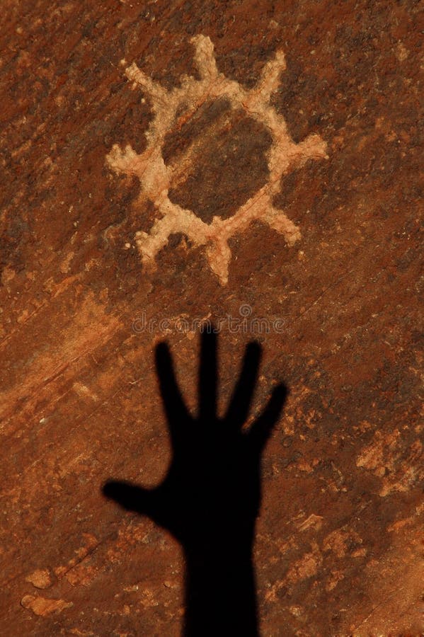 Sun symbol rock carving stock image. Image of stone, bronze - 32975383