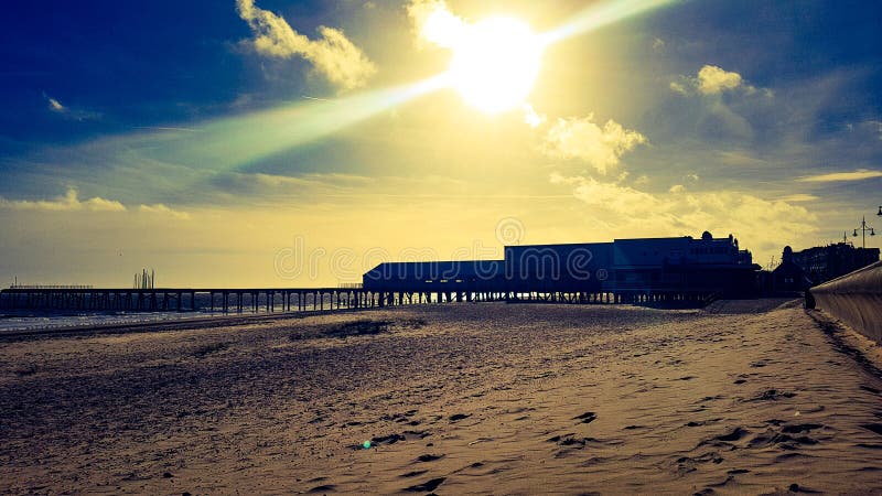 Sun stock photo. Image of lowestoft, beach, pier - 135114820