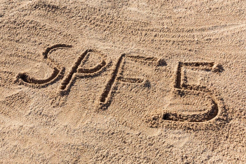 Sun Protect Factor Concept. SPF Word Written on the Beach with Question ...
