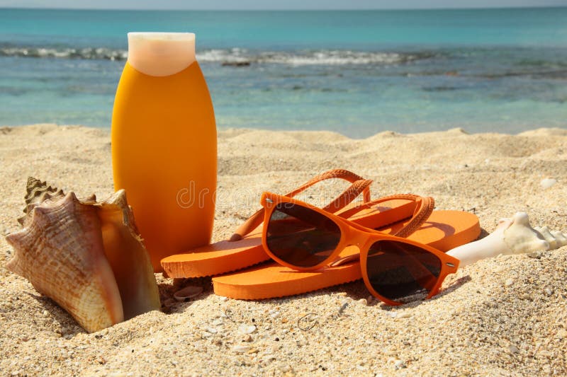 Sun Protection on a Beach stock image. Image of lotion - 50946085