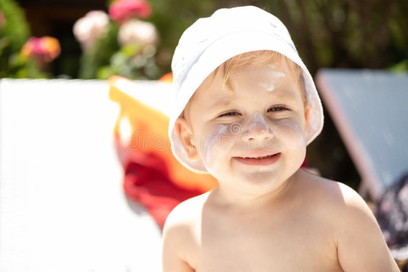 Sun Protection. Close Up Portrait of Smiling Boy Face with Sunscreen ...