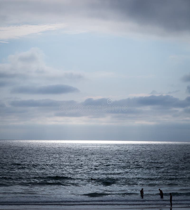 Sun Radiates through a Cloud and Creates Ocean Spotlight Stock Image ...