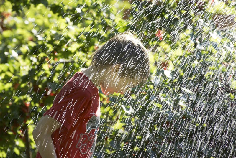 Sun rain stock photo. Image of playful, refreshment, summertime - 6417406