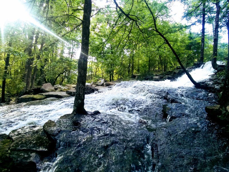 Sun on the rapids stock photo. Image of rock, waterfall - 194259532