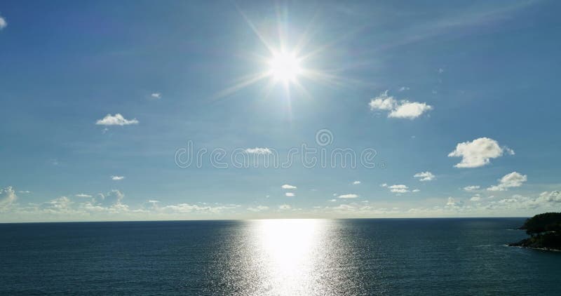 Sun Ray in Clear Blue Sky and White Cloud Over Ocean Stock Video ...