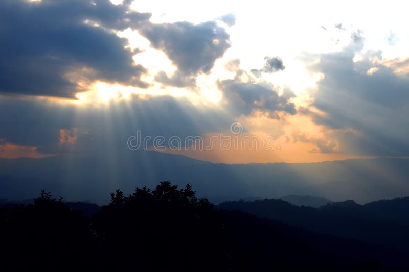Sun Ray of Sun Light Shining Down on Cloud and Sky with Silhouette Dusk ...
