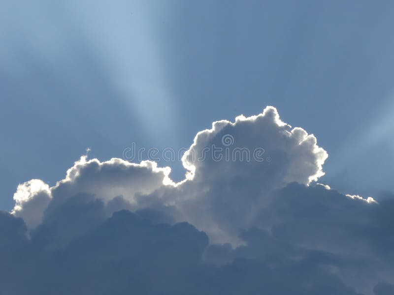 Sun Rays and Sun Behind the Clouds Stock Image - Image of skies, blue ...