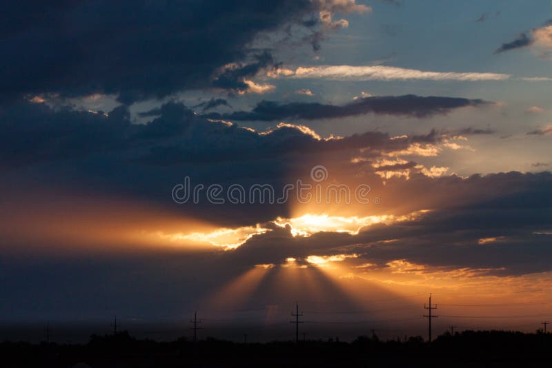 Sun Rays Behind Clouds stock image. Image of deep, gold - 62983699