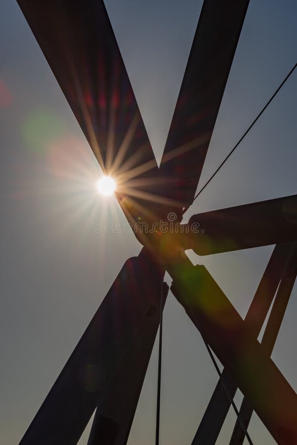 Sun Rays Behind a Dark Steel Construction Stock Image - Image of rays ...