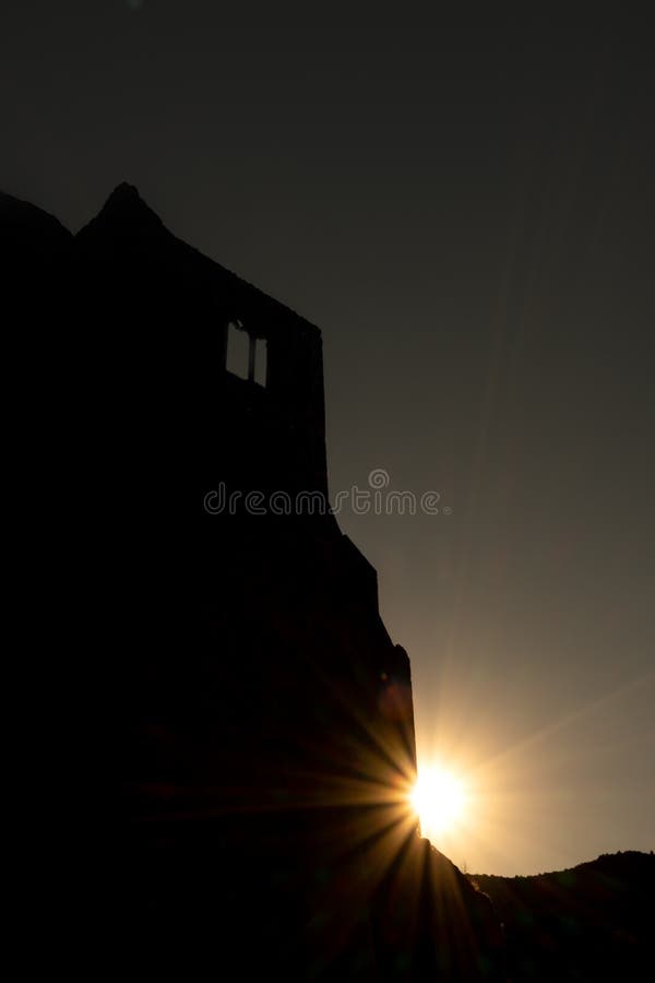 Sun Rays Break Against a Wall Silhouette Stock Photo - Image of ancient ...