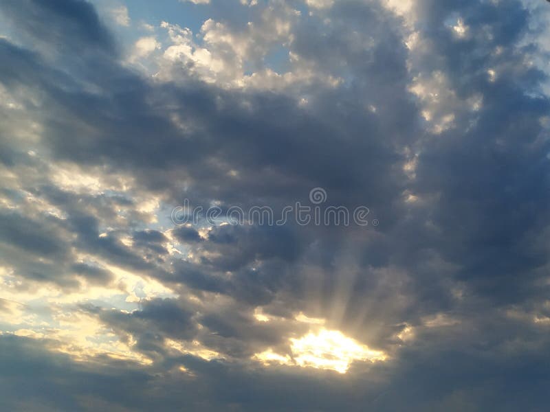 Sun Rays Breaking through Clouds Stock Photo - Image of dramatic, cumulus: 394634544