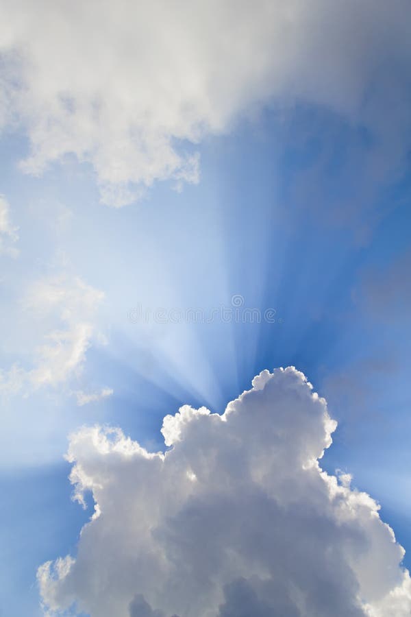 Sun Rays Breaking through Cumulus Clouds Stock Image - Image of bright ...