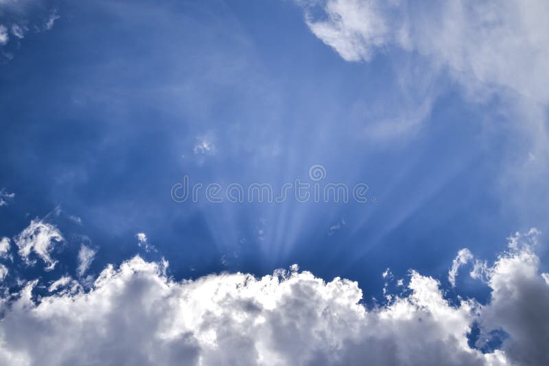 Sun Rays Breaking through Cumulus Clouds. Heavenly Landscape Stock ...