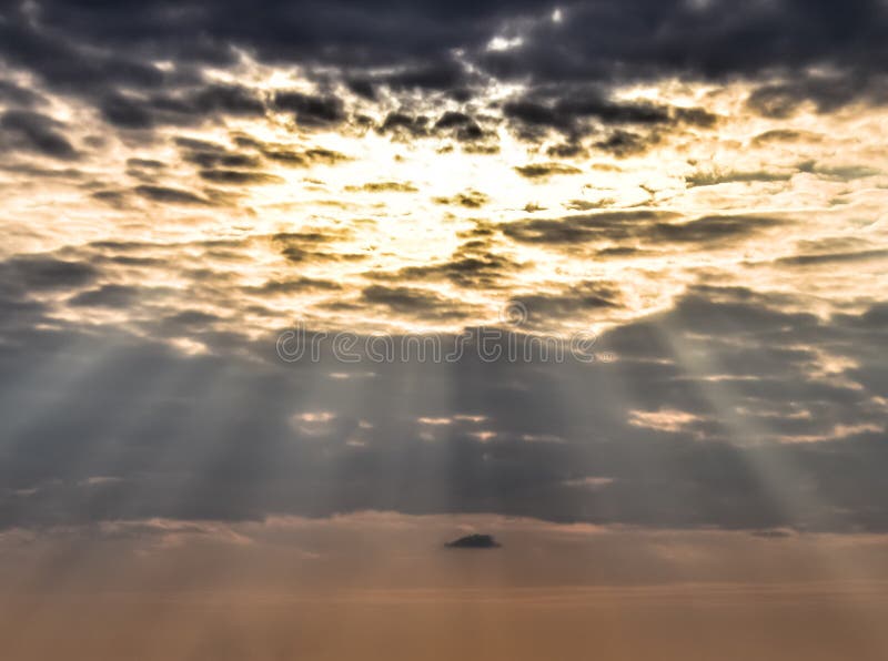 Sun Rays Breaking through Cumulus Clouds. Heavenly Landscape Stock ...