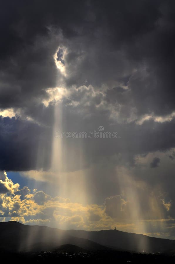 Sun Rays in Clouds and Mountains Stock Photo - Image of environmental ...