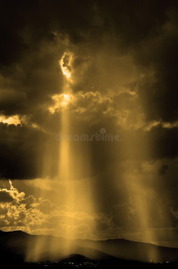 Sun Rays in Clouds and Mountains Golden Light Stock Photo - Image of ...