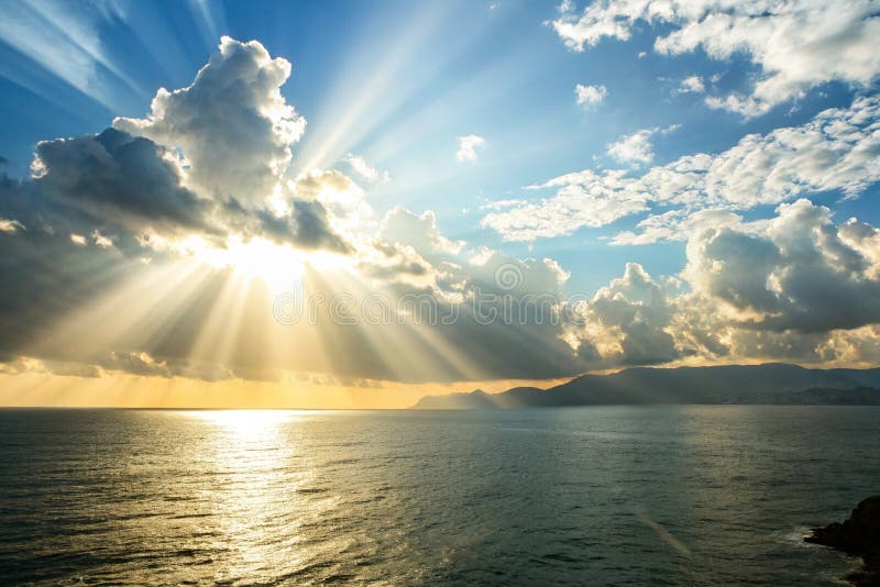 Sun Rays through Clouds Over the Sea Stock Illustration - Illustration ...