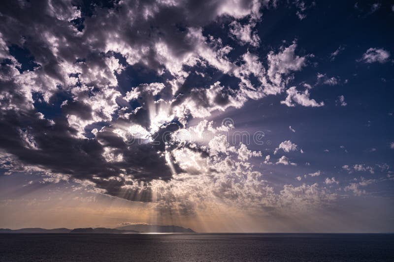 Sun Rays through the Clouds Stock Image - Image of light, honeymoon ...
