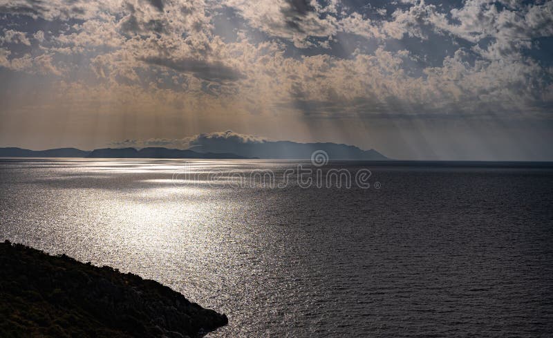 Sun Rays through the Clouds Stock Image - Image of light, honeymoon ...