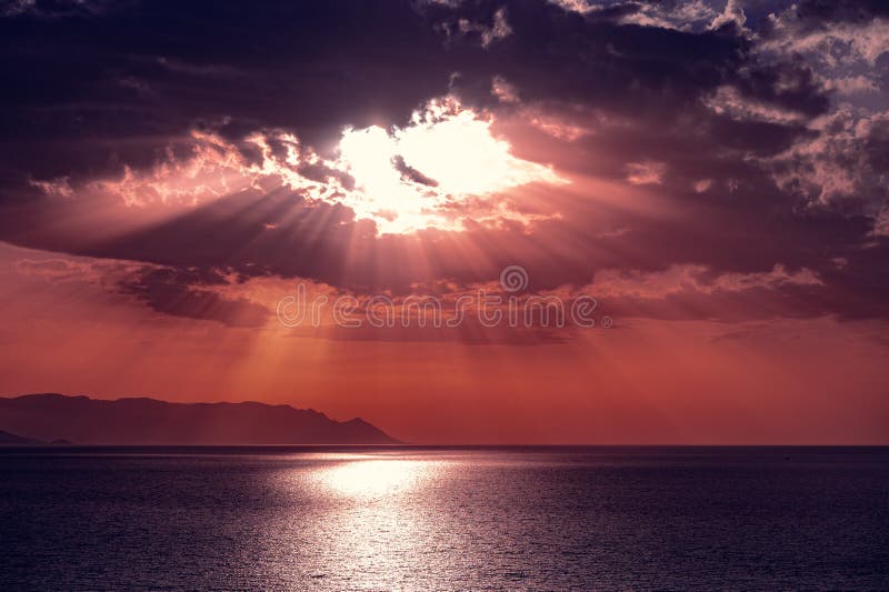 Sun Rays through the Clouds Stock Photo - Image of dawn, beautiful ...