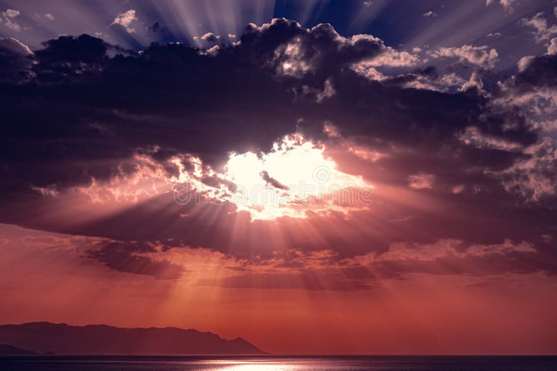 Sun Rays through the Clouds Stock Image - Image of light, honeymoon ...