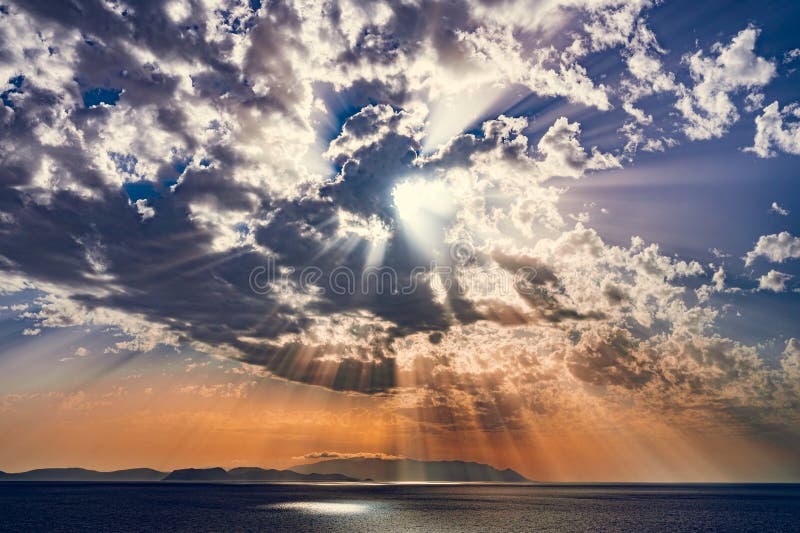 Sun Rays through the Clouds Stock Photo - Image of panoramic, beach ...
