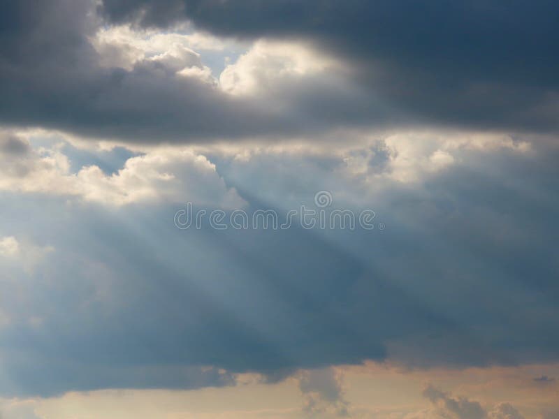 Sun rays from clouds stock image. Image of sunset, dark - 172025247