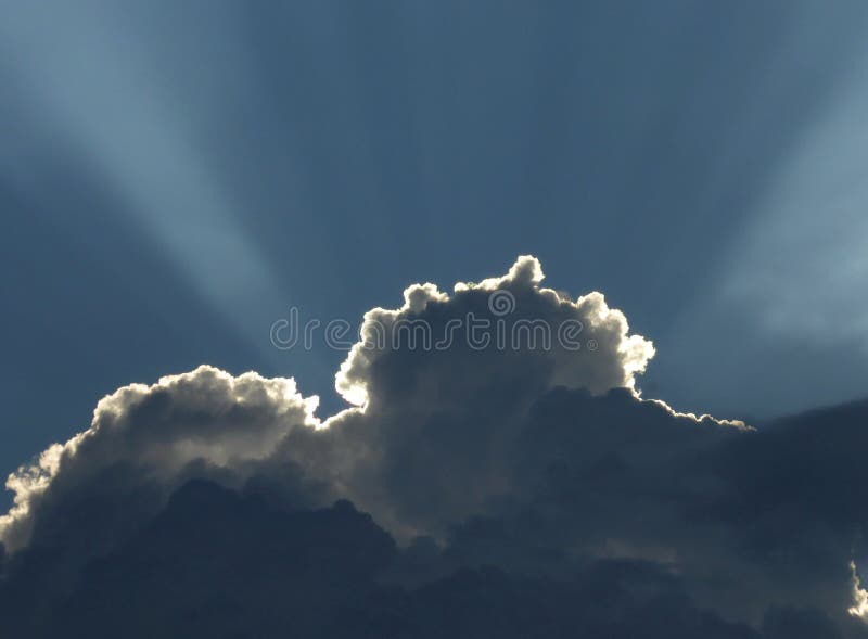 Sun rays and clouds stock image. Image of beautiful, clouds - 71113591
