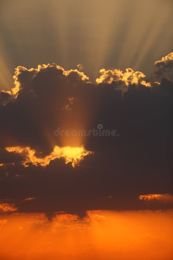 Sun Rays through the Clouds at Sunset Stock Photo - Image of color ...
