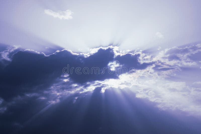 Sun Rays from Cloudy Sky Reflection Stock Image - Image of blue, cloudy ...