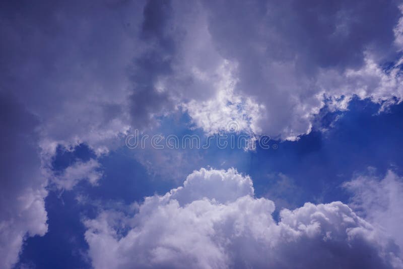 SUN RAYS COMING OUT of the CLOUDS Stock Image - Image of horizon ...
