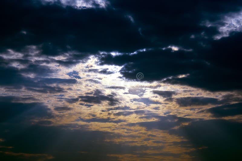 Sun Rays through Dark Clouds, Dramatic Dark Sky Stock Photo - Image of ...