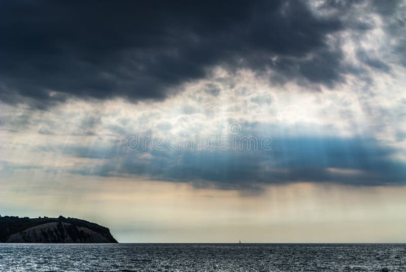 Sun Rays on Dark Cloudy Sky Stock Image - Image of overcast, back: 98317257