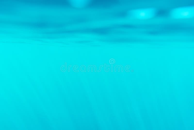 Sun Rays in Deep Blue Water Stock Image - Image of blurred, deep: 235409711