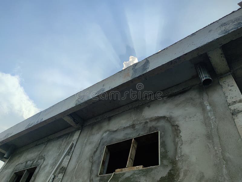 Sun Rays Emerging Above Concrete Building Stock Image - Image of ...