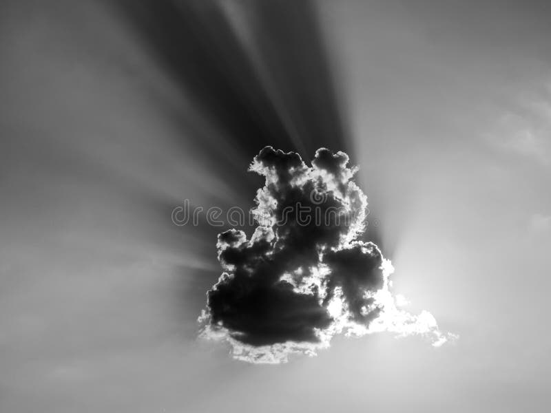 Sun Rays from the Evening Sun Behind Small Cloud Stock Image - Image of ...