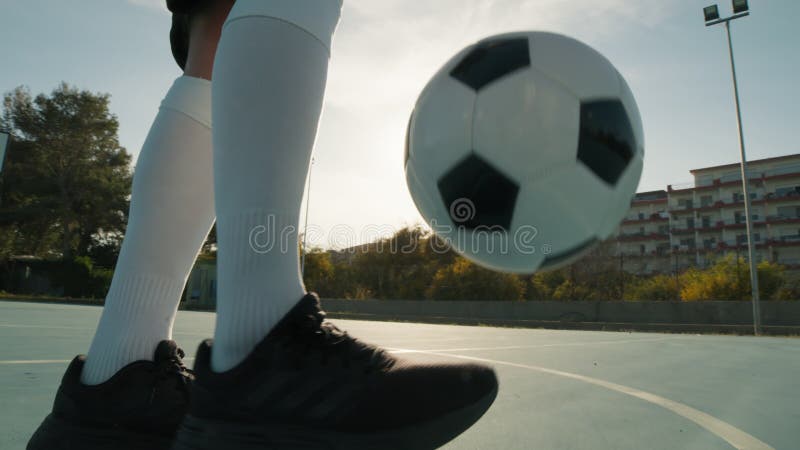 Sun Rays Hitting the Ball in the Player Foot Stock Footage - Video of ...