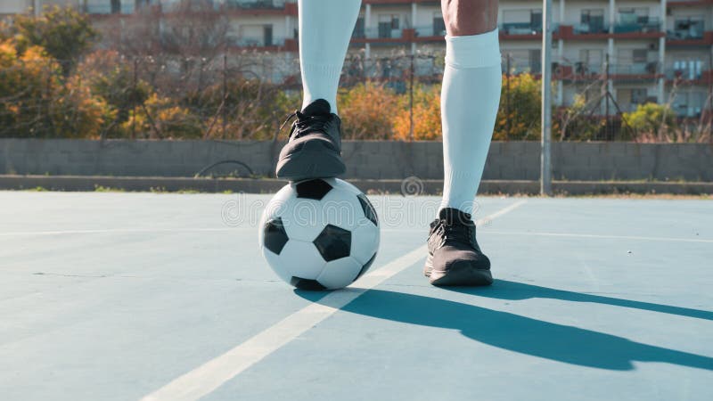 Sun Rays Hitting the Ball in the Player Foot Stock Photo - Image of ...