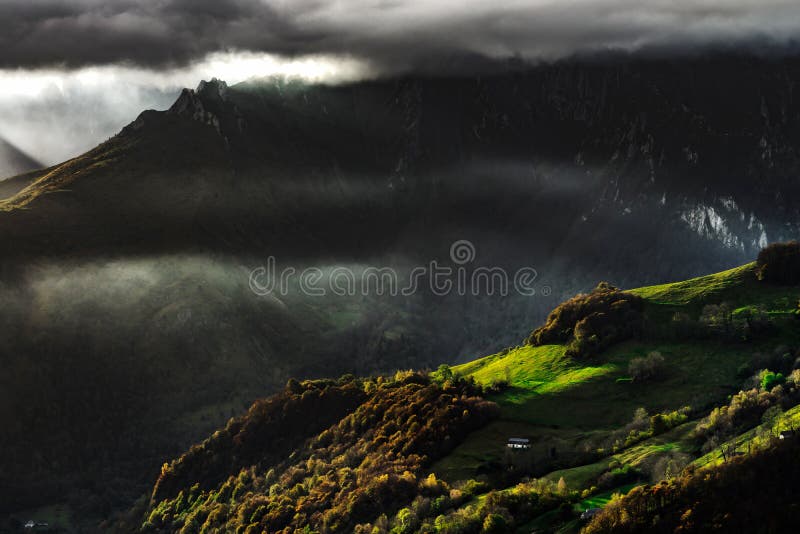 Sun Rays Lighting through the Clouds in High Pyrenees Stock Image ...