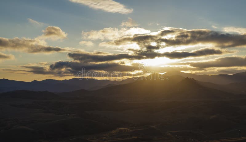 Sun Rays Lits Thru the Clouds Over the Valley Stock Photo - Image of ...