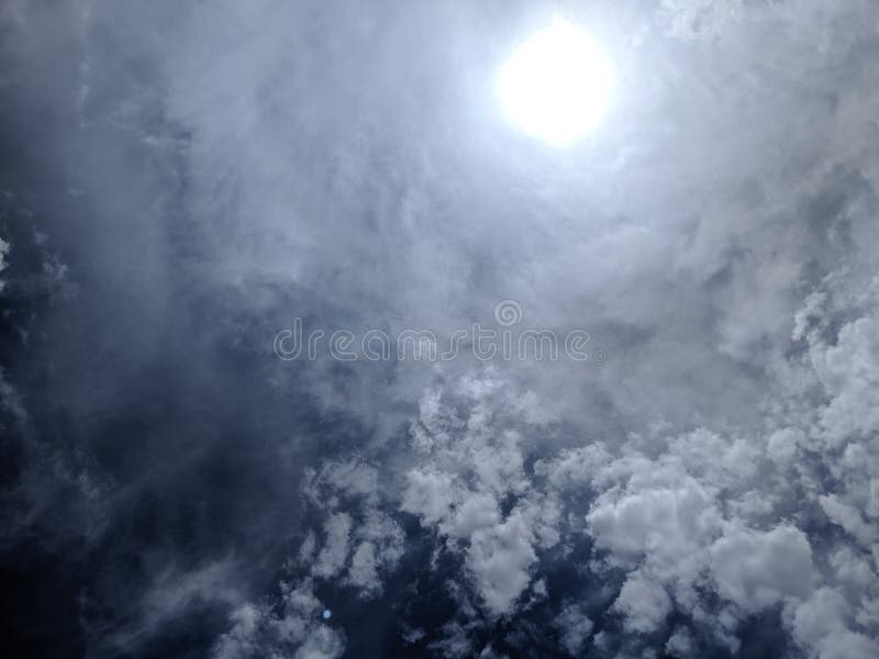 Sun Rays through Misty Clouds Stock Photo - Image of misty, sunrays ...