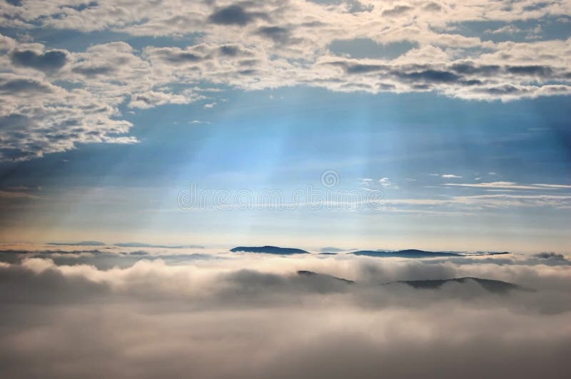 Sun rays over the clouds stock photo. Image of environmental - 22820556