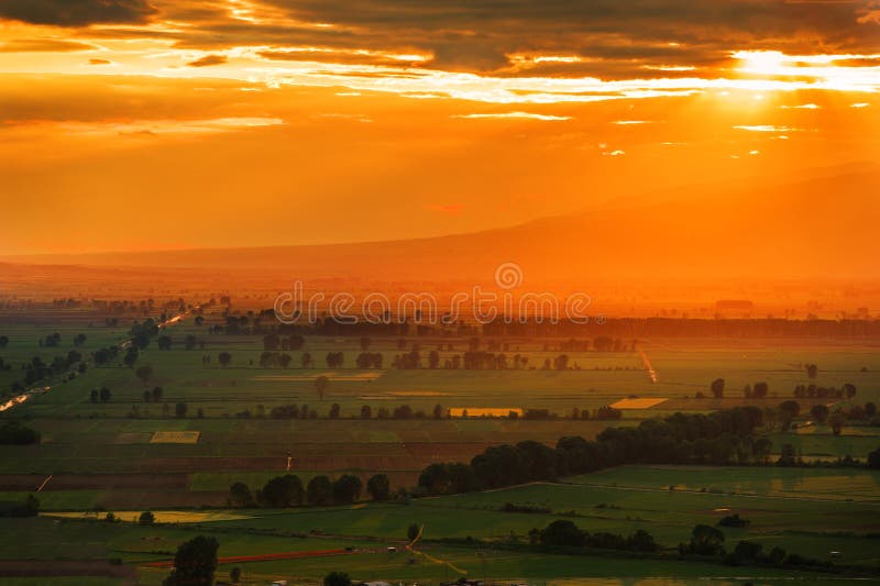 Sun rays over the field stock photo. Image of mountain - 28797834