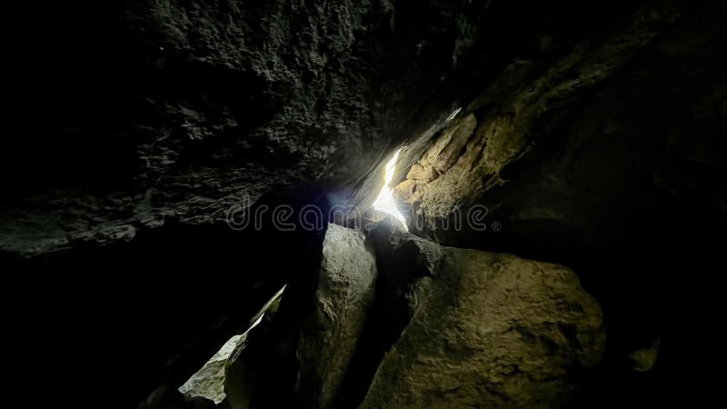 Sun Rays Pass through the Stones in a Cave. Poland Stock Photo - Image ...