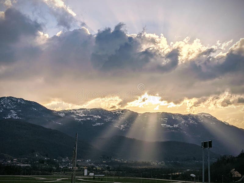Sun Rays Piercing through Clouds Stock Photo - Image of outdoor ...